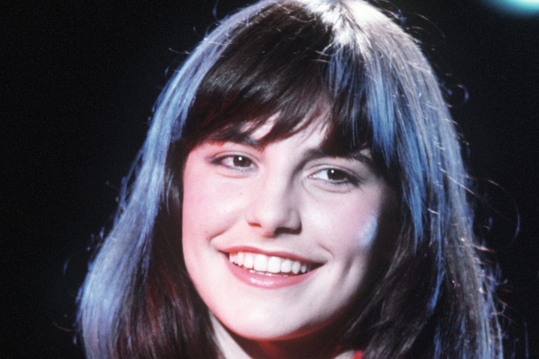 Les looks beauté iconiques de Lio