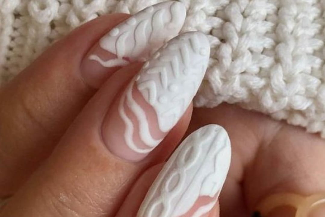 Nail art ongles effet pull de Noël